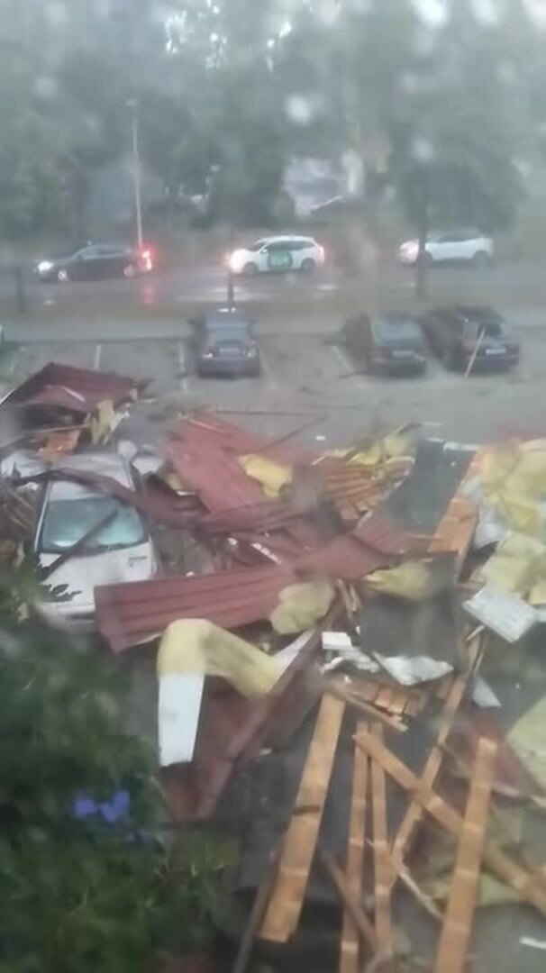 Roof Flies Off in Storm and Crashes on Parked Car | Jukin Licensing