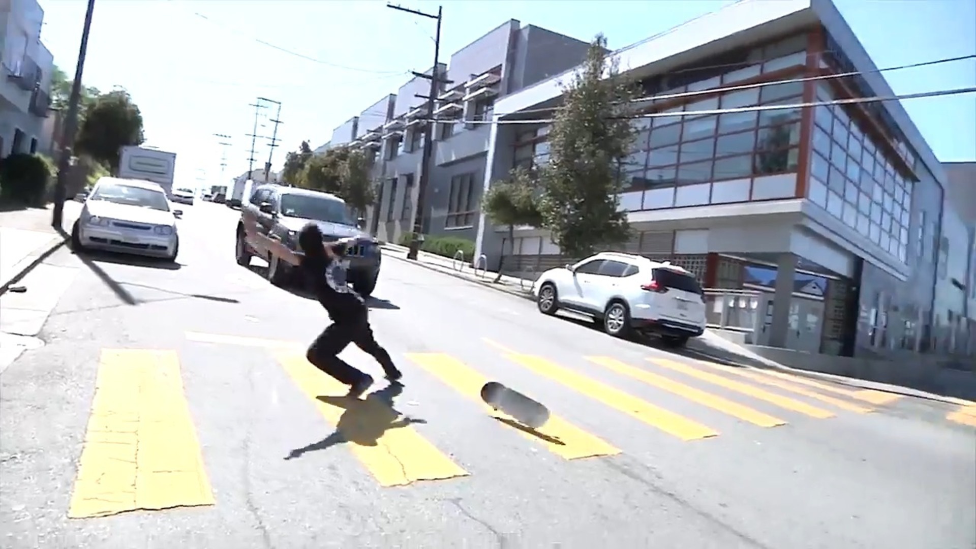 Skateboarder Almost Gets Hit by Car Running Stop Sign | Jukin Licensing