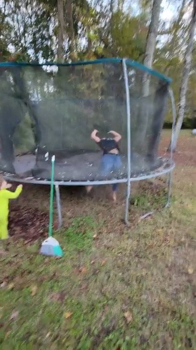 Woman Falls Through Trampoline as it Bursts During Her Attempt to ...