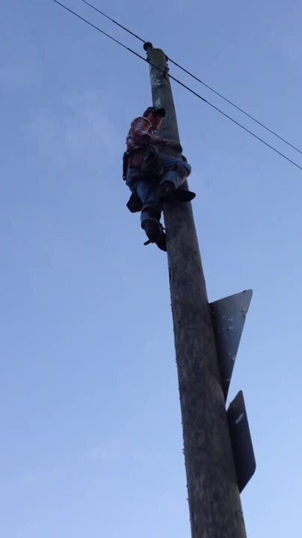 Trainee Loses His Footing and Slips Halfway Down Electric Pole | Jukin ...