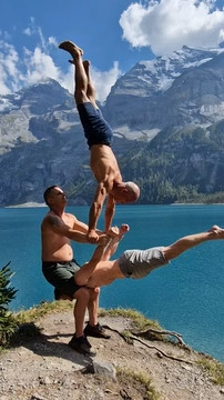 Three Men Create Iconic Acrobatic Formation Next to Lake For Photoshoot ...