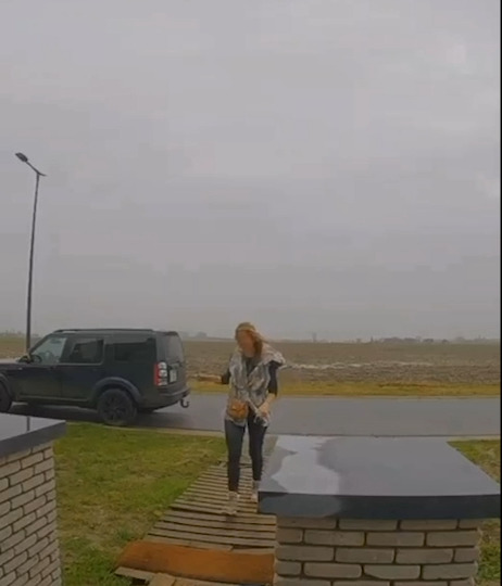 Woman Loses Footing and Falls on Icy Wooden Walkway | Jukin Licensing