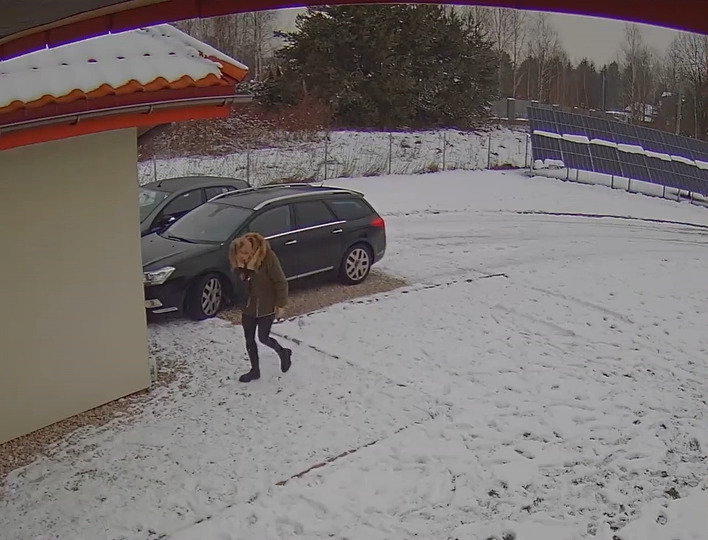 Woman Loses Footing on Snow Covered Driveway and Falls | Jukin Licensing