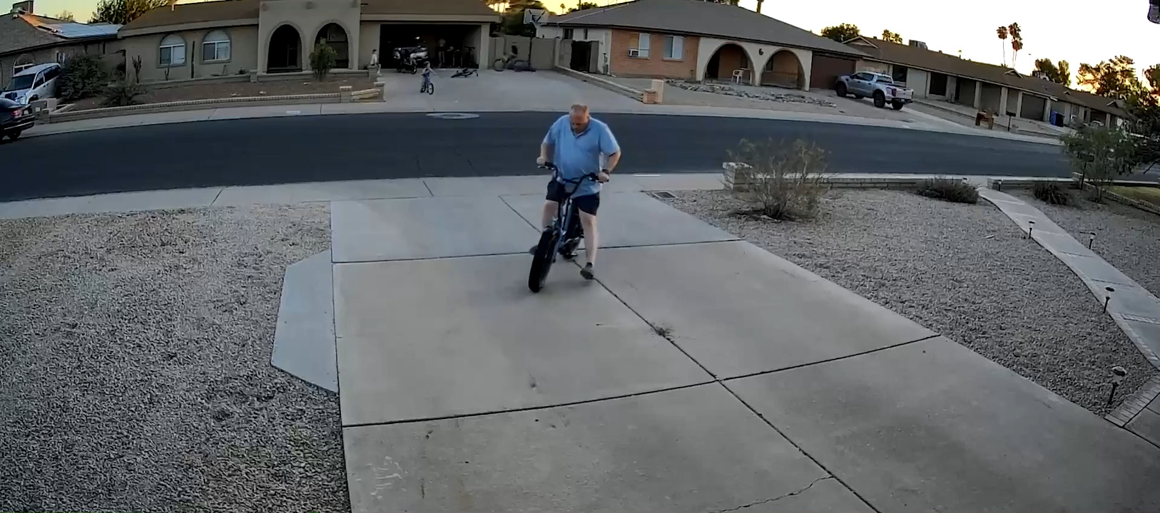 Man Getting Off E-bike on Driveway Loses Balance and Falls | Jukin ...