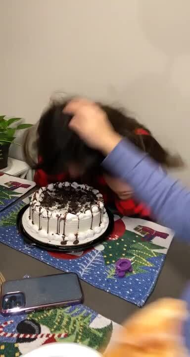 Woman Shoves Her Sister's Face Into Hard Ice Cream Cake | Jukin Licensing