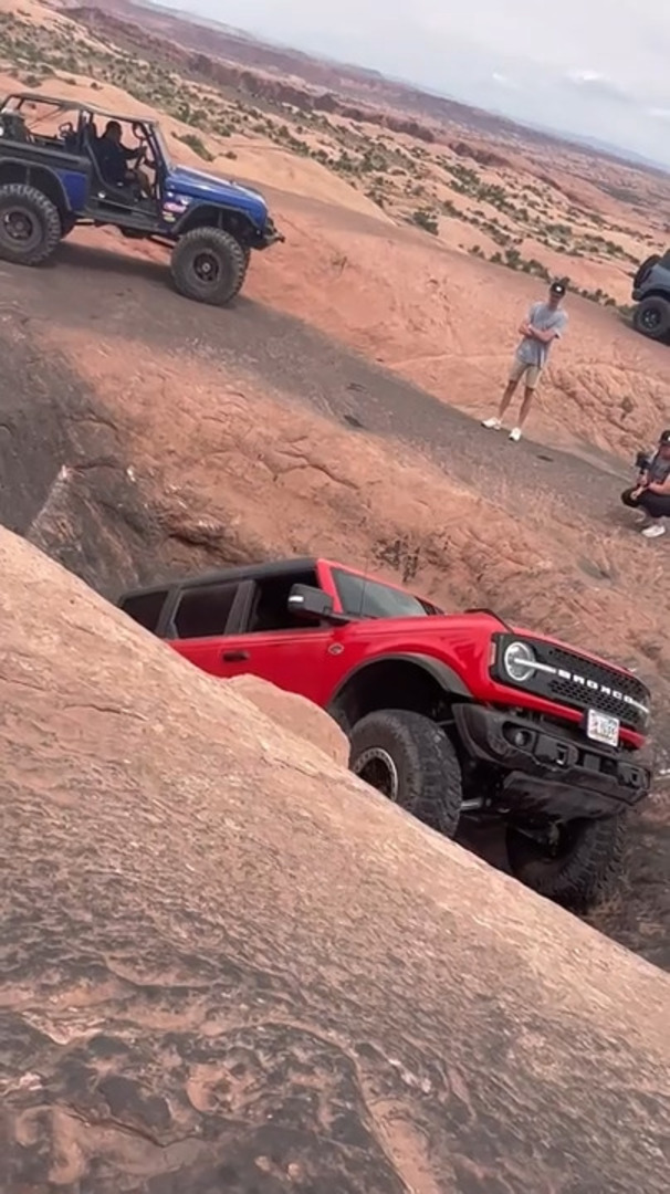 SUV Bronco Hits Side of Wall and Almost Flips Over While Driving ...