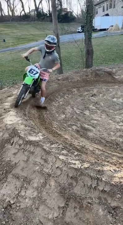 Person Riding Mini Bike Loses Balance at Curve and Falls | Jukin Licensing