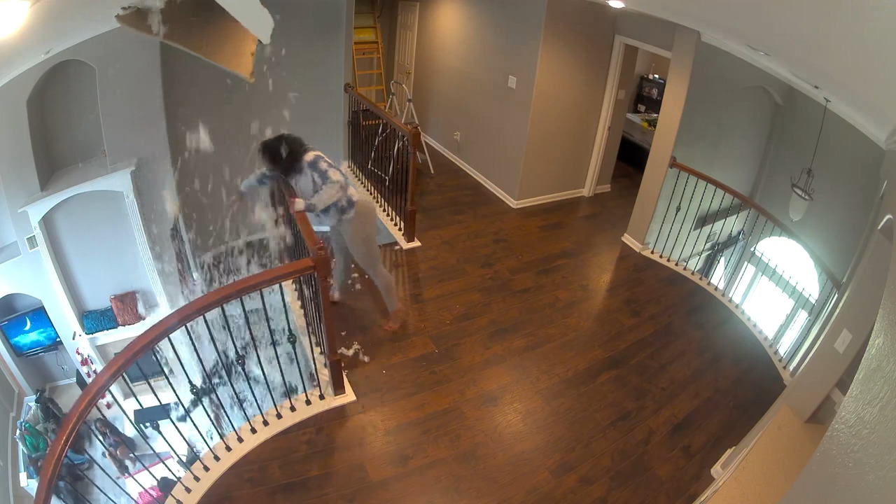 Woman Freaks Out as Daughter Falls Through House Ceiling | Jukin Licensing