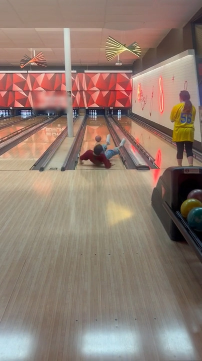 Person Slips and Falls While Rolling Bowling Ball | Jukin Licensing