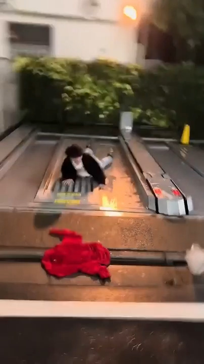 Guy Falls on Slippery Road After Failed Kick Attempt | Jukin Licensing