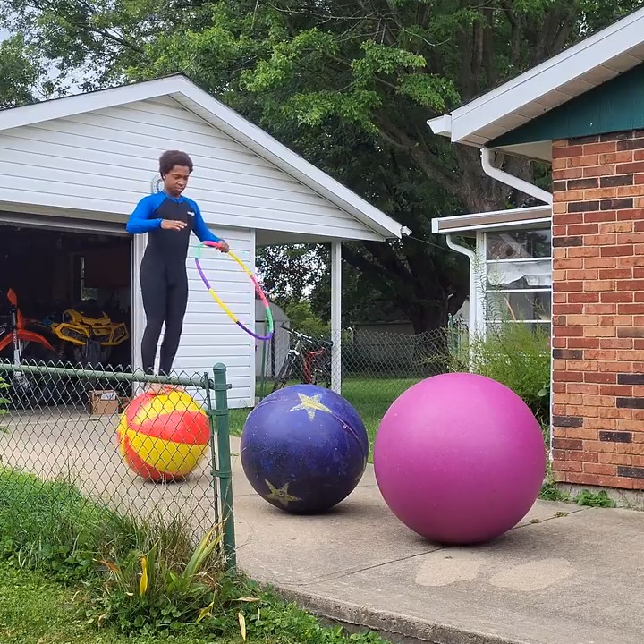 Man Performs Jump Trick Using Hula Hoop and Circus Balls | Jukin Licensing