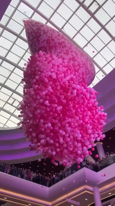 People Gather Inside Shopping Center For Valentine's Day Ballon Drop ...