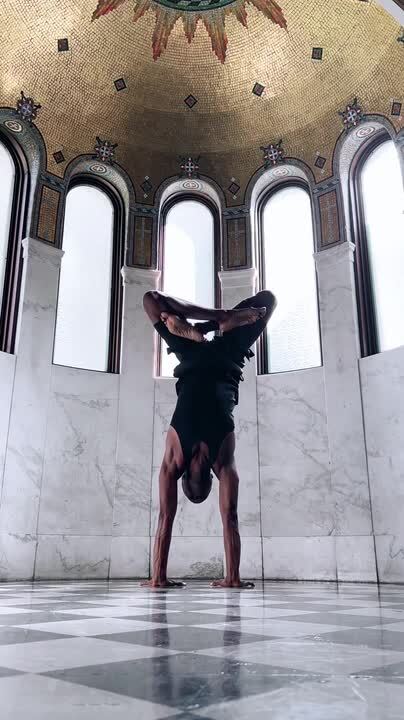 Man Performs One Handed Upside Down Lotus Position | Jukin Licensing