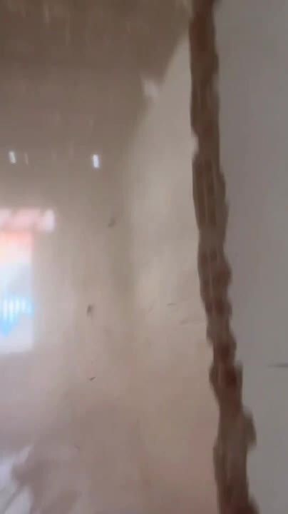 False Ceiling Collapses When Woman Tries to Shove It With Metal Rod ...