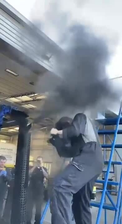 Workers Prank Garage Apprentice by Blowing Black Smoke Into Their Face ...