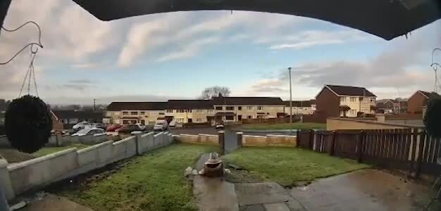 Woman Stepping Outside Loses Footing on Slippery Walkway and Falls on ...