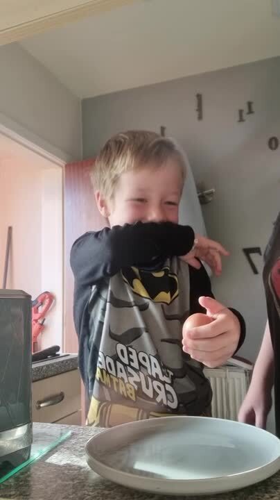 Little Kid Gets Surprised as Mother Breaks Egg by Tapping His Forehead ...