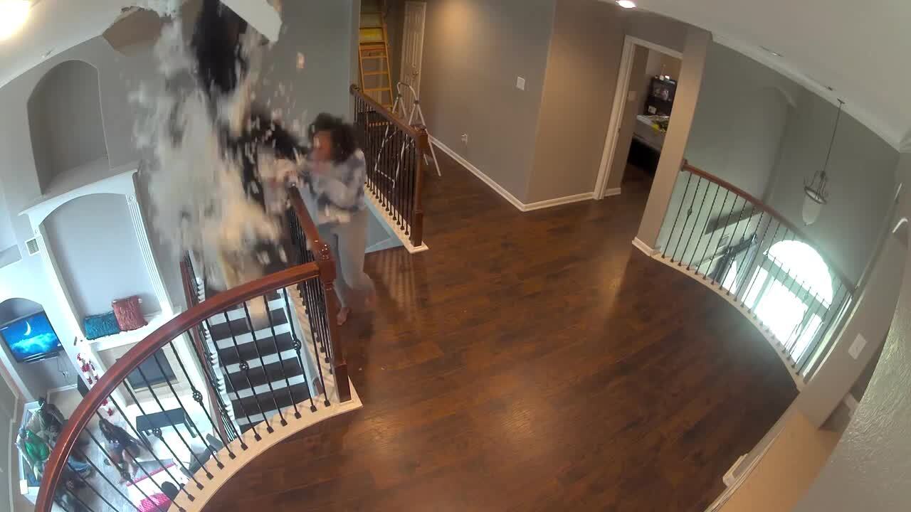 Woman Freaks Out as Daughter Falls Through House Ceiling | Jukin Licensing
