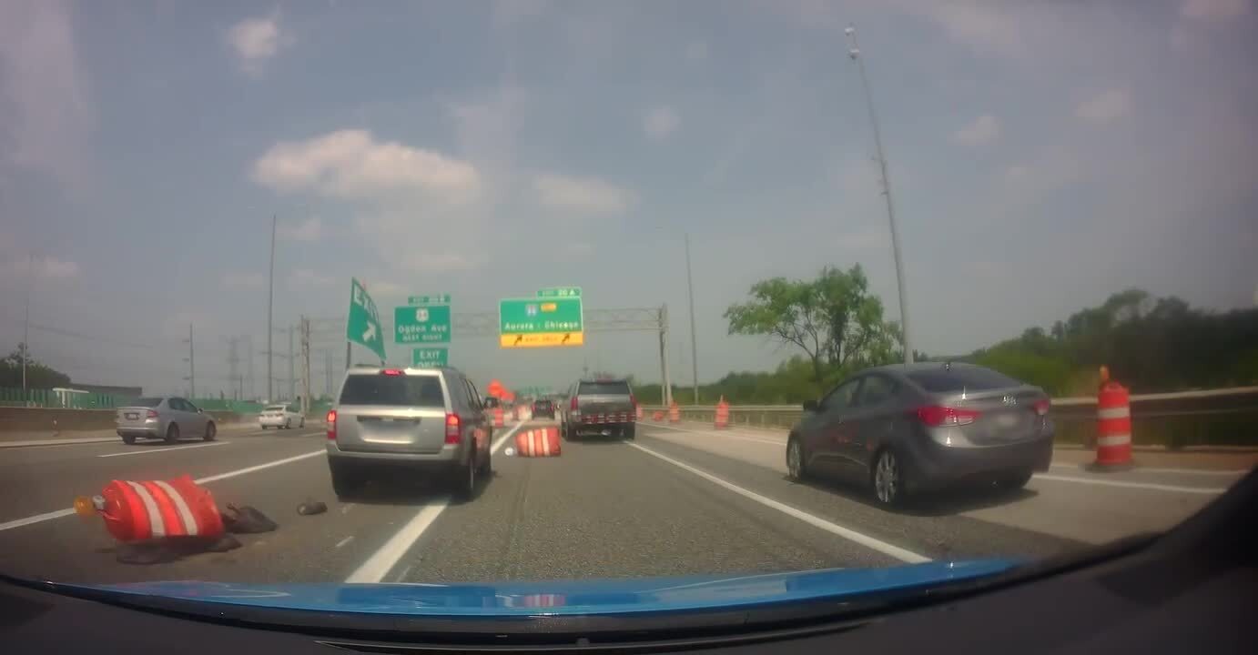 SUV Exiting Highway Accidentally Crashes Into Construction Cones ...