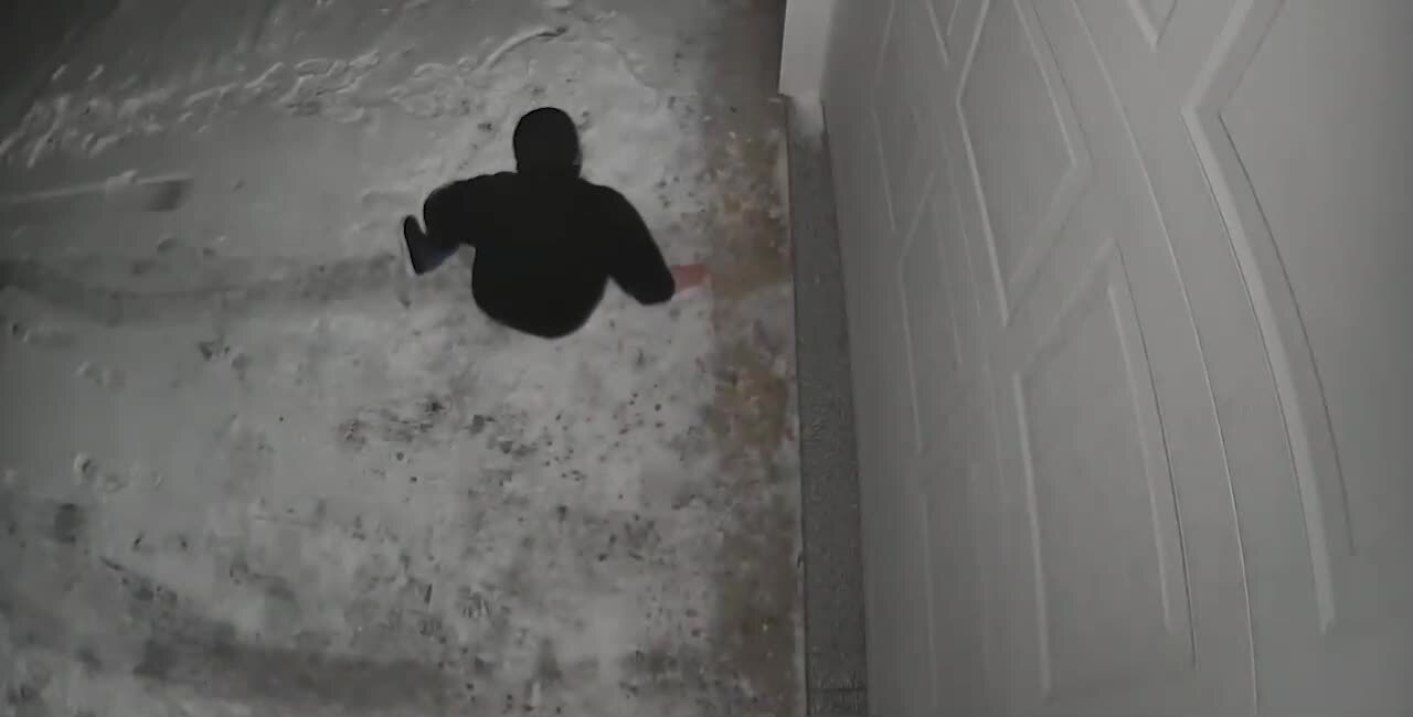 Man Headed to Garage Loses Footing in Snow and Falls | Jukin Licensing