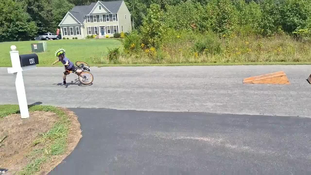 Kid Riding Bike Falls While Attempting to Perform Trick on Ramp | Jukin ...