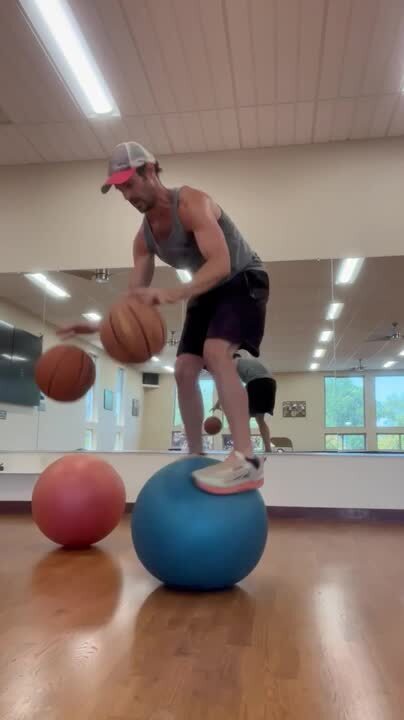 Person Performs Balancing Tricks on Gym Balls and Balance Board | Jukin ...