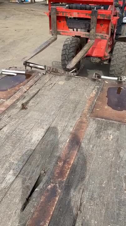 Ladders Break as Person Attempts to Drive Over Them to Reach Higher ...