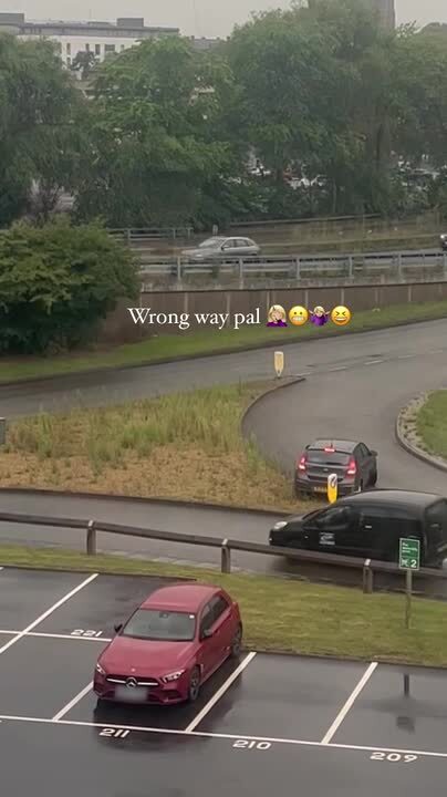 Driver Reverses Car After Taking Wrong Turn and Breaks Signboard ...