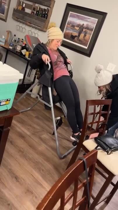 Girl Falls on Her Back While Trying to Stretch on Inversion Table ...