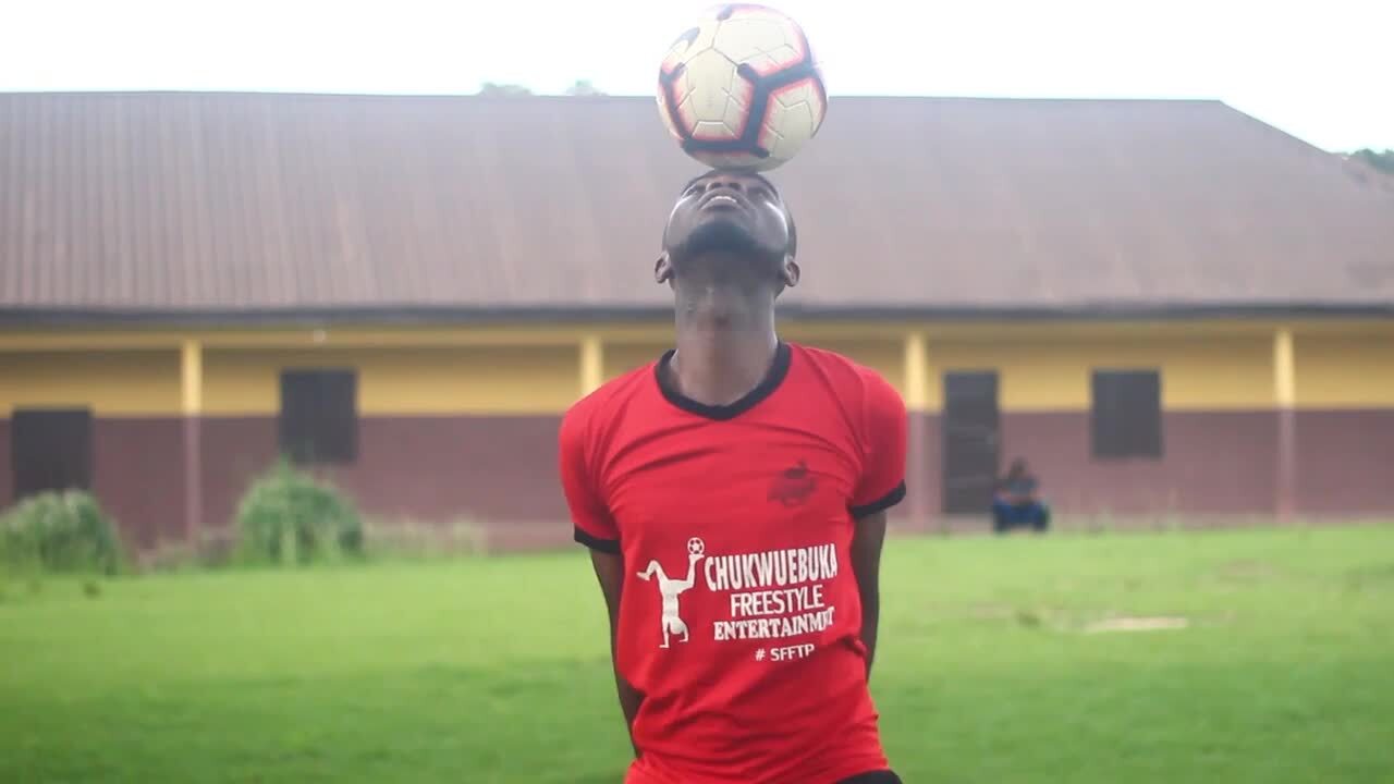 Guy Shows Insane Shoulder Flexibility While Balancing Football on ...