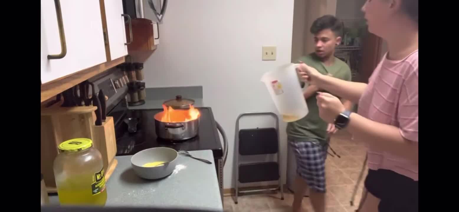 Guy Accidentally Sets Pot on Fire While Cooking Inside it Over Oven ...