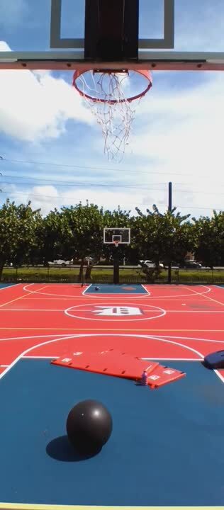 Man Performs Impressive Basketball Trick Shot While Sitting on Yoga ...