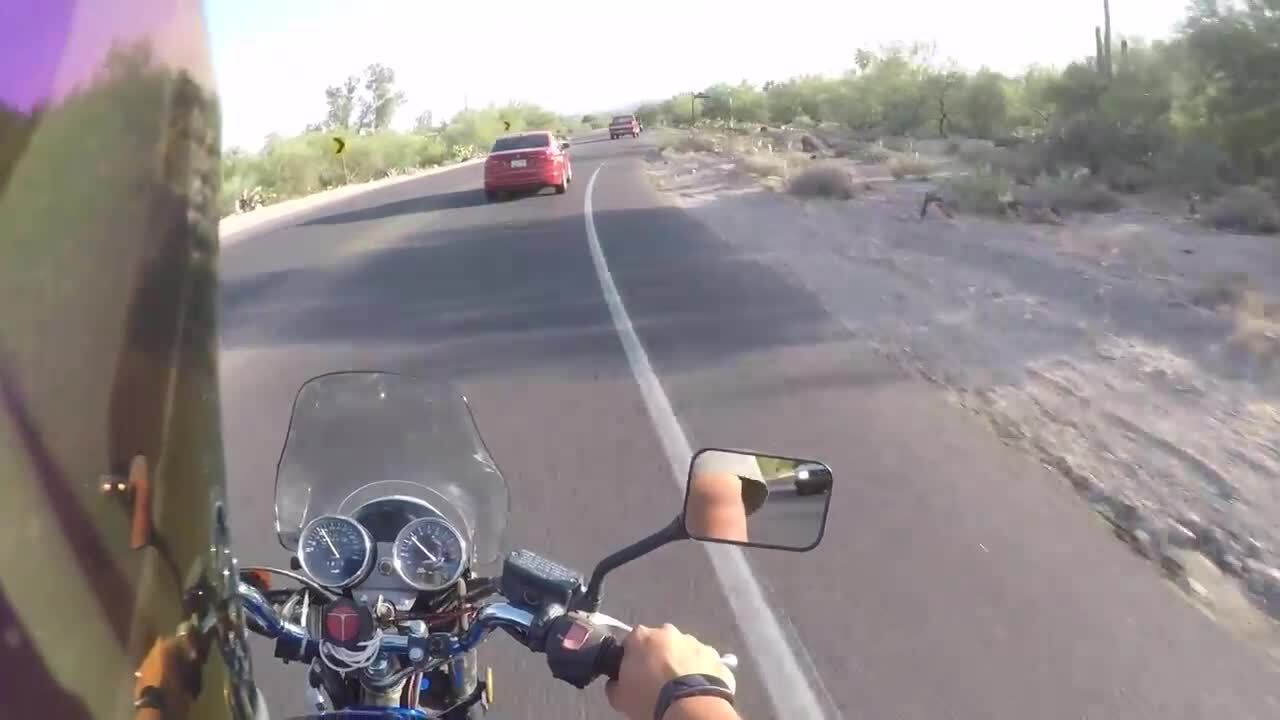 Overtaking Battle between Motorcycle and Car | Jukin Licensing