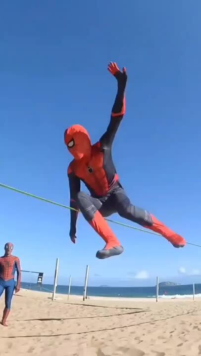 Guy Performs Tricks on Slackline in Superhero Costume | Jukin Licensing