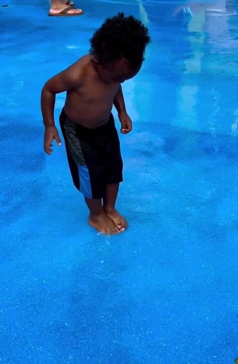 Toddler Repeatedly Gets Sprayed in the Face by Water Jet | Jukin Licensing