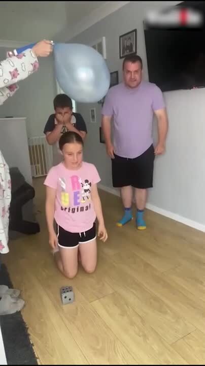 Family Plays Balloon Pumping Game | Jukin Licensing