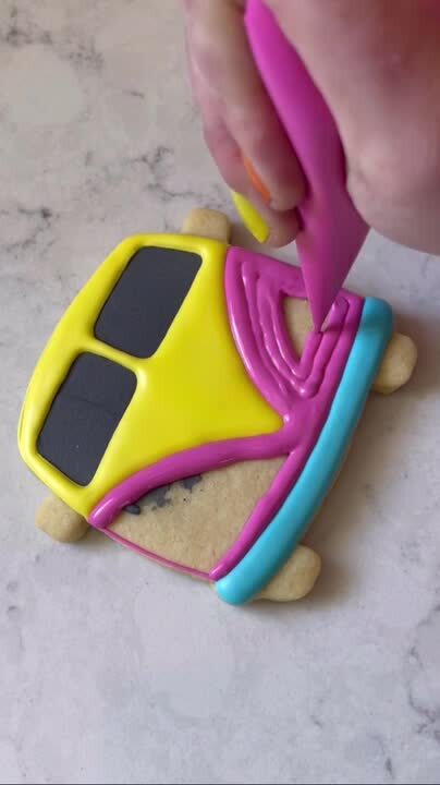Artist Decorates Van-Shaped Cookie With Colorful Icing | Jukin Licensing