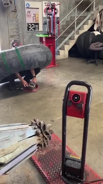 Store Employees Maintain Social Distance By Wearing Tractor Tubes ...