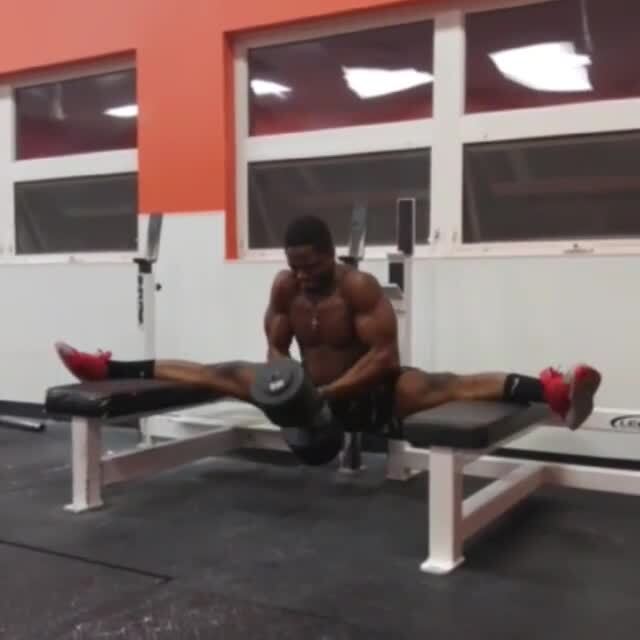 Guy Lifts Weight While in Splits Position | Jukin Licensing