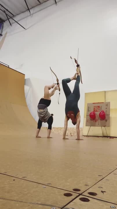 Talented Duo Hits the Target While Performing Foot Archery | Jukin ...