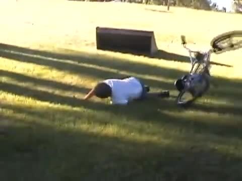 Kid Ends up Falling on Ground Face First While Trying to Jump Over Ramp ...