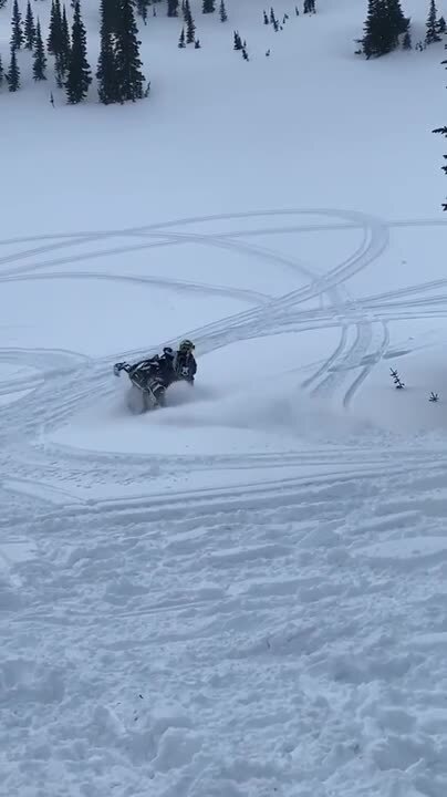 Person Demonstrates Incredible Sled Tricks On Snowmobile | Jukin Licensing