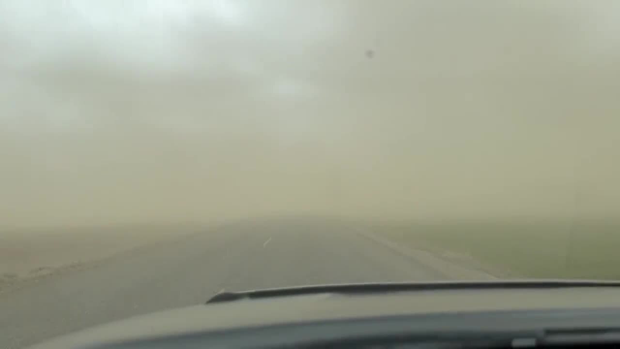 Person Drives in Decreased Visibility Due to Dust Storm | Jukin Licensing