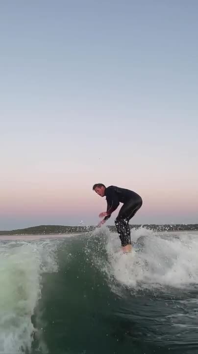 Surfer Performs Tricks While Surfing | Jukin Licensing