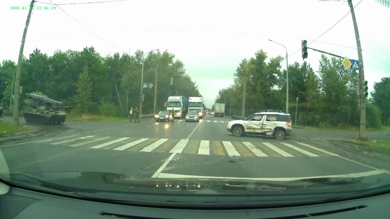 Armored Vehicle Hits Car in Intersection | Jukin Licensing