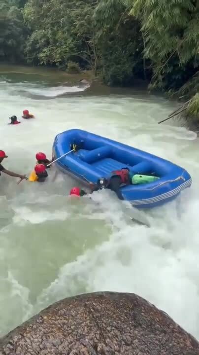 People Fall Out of Rafting Boat as it Topples Over Due to Strong Rapids ...