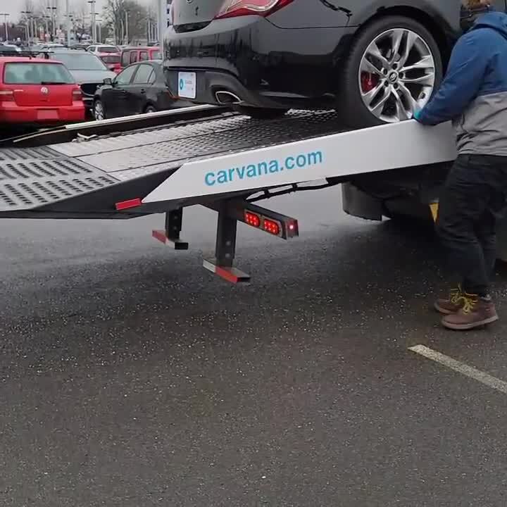 New Car Falls Off Trailer's Ramp With Thud During Delivery | Jukin ...