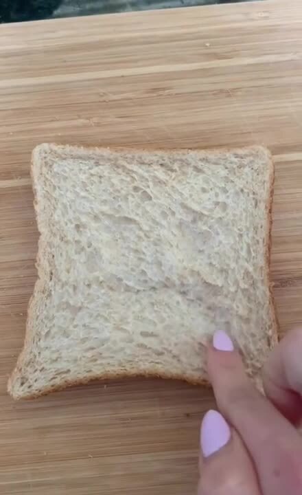 Woman Shows How to Make Grumpy Faced Bread Toast | Jukin Licensing