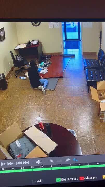 Desk Collapses as Woman Attempts to Move It | Jukin Licensing