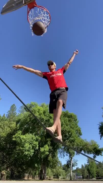 Guy Shoots Hoops While Balancing on Slackline | Jukin Licensing